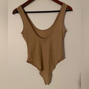 Tops | Forever 21 Medium Mesh Tan Body Suit | Poshmark